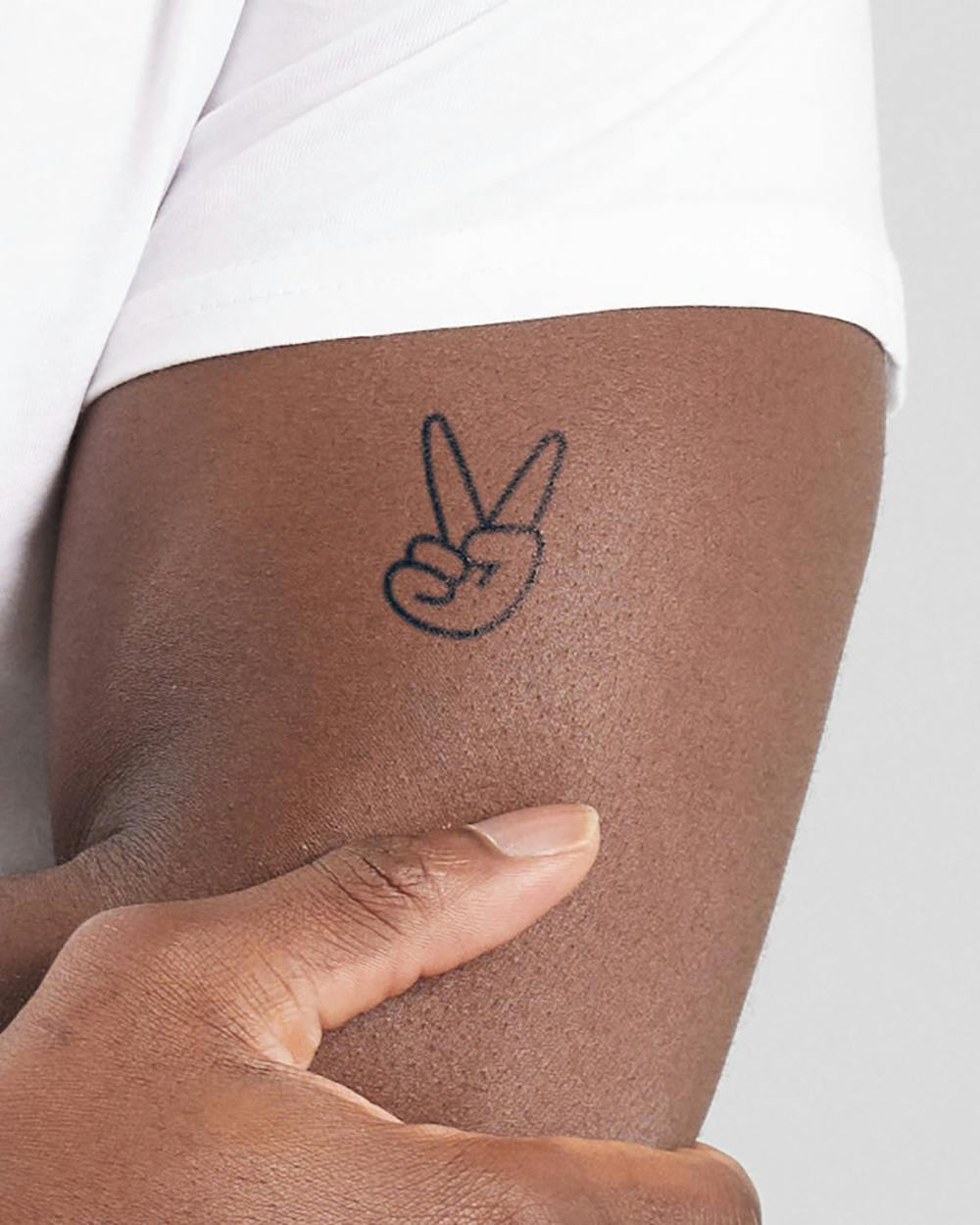 Peace Sign Tattoos On Finger